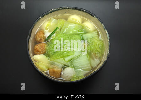 boiled Chinese cabbage with egg tofu and minced pork soup in hot pot ...