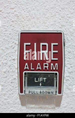 Fire alarm press here box on wall Stock Photo - Alamy