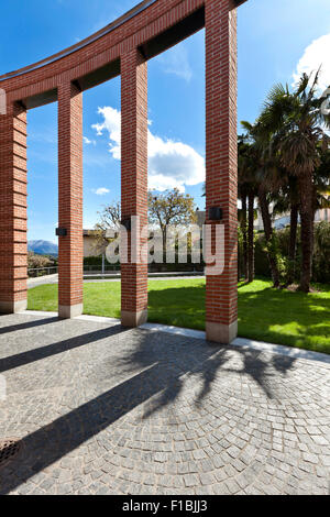 modern bricks house, patio with columns Stock Photo - Alamy