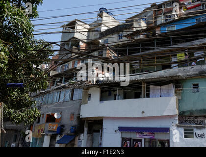 Messy overhead cabling and multi story buildings in the Rochina Favela ...