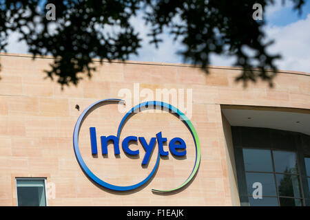A logo sign outside of the headquarters of the Incyte Corporation in ...