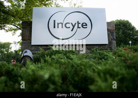 A logo sign outside of the headquarters of the Incyte Corporation in ...
