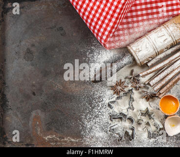 Christmas cookies background with cutters and flour. Holiday concept ...