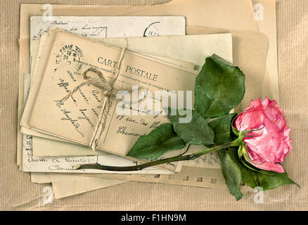 Old letters, rose flower and antique feather pen. Romantic sentimental ...
