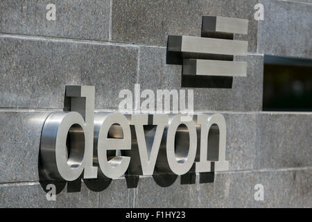 A logo sign outside of the Devon Energy Center, headquarters of the ...