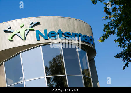 A logo sign outside of the headquarters of Netsmart Technologies in ...