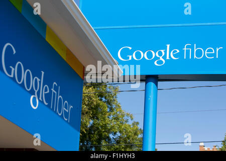 A logo sign outside of a Google Fiber sales office in Kansas City ...