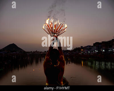 Aarti with fire of Holy Pushkar Lake at evening, Rajasthan, India Stock ...