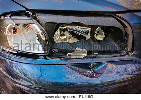 Detail of vehicle frontal damage of a car accident with policeman Stock ...