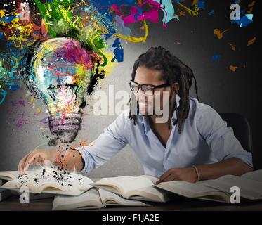 businessman drawing colorful light bulb Stock Photo - Alamy