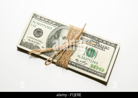 One pack of dollars on over white Stock Photo - Alamy