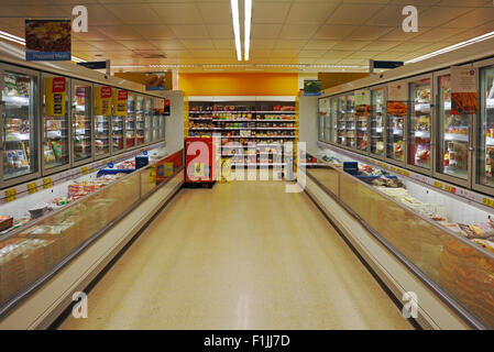 Frozen food shopping aisle Tesco supermarket store interior cold ...