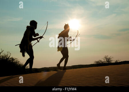 Bushmen tracking game Stock Photo - Alamy