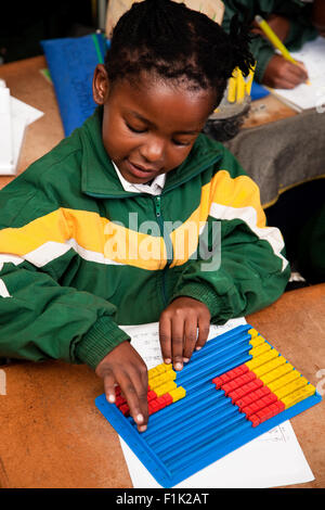 A young girl using an abacus, Meyerton Primary School, Meyerton ...