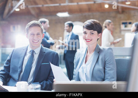 Portrait of business people smiling in an office Stock Photo - Alamy