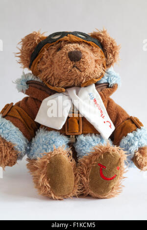 A close up of the TUI logo on the tail fin of a passenger aircraft ...