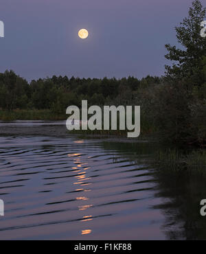 Moonlight on the river Stock Photo - Alamy