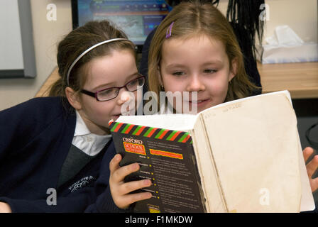two kids learning English Stock Photo - Alamy