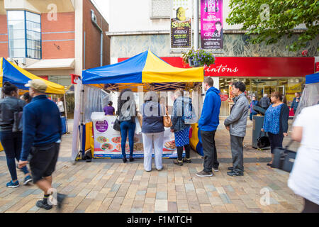 People waiting to be served at a Thai Kitchen stall at Wolverhampton ...