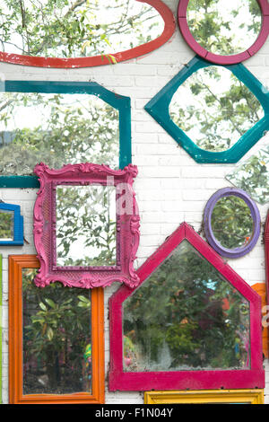 Decorative colored mirrors and picture frames in Mackenzie Childs, Soho ...