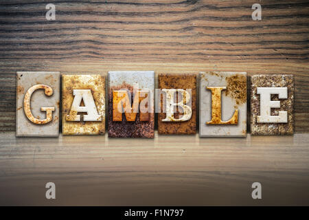 The word "GAMBLE" written in rusty metal letterpress type on an old ...