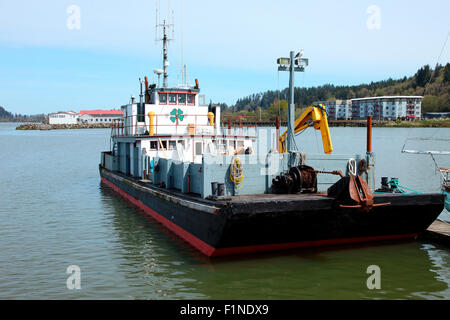 Utility barge serving around the marina and ports in Astoria Oregon ...