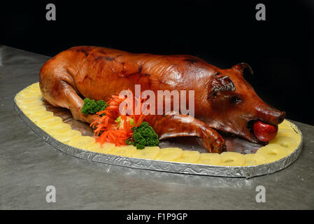 A whole roasted pig ready to serve Stock Photo - Alamy