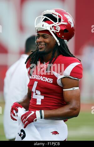Arkansas wide receiver Keon Hatcher (4) is congratulated by teammates ...