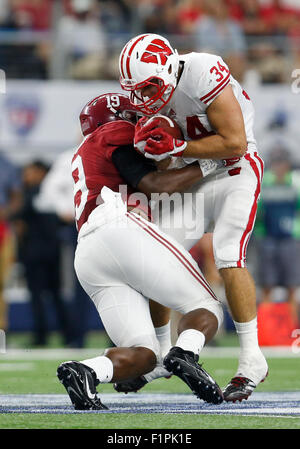 Alabama linebacker Reggie Ragland (19) hits Auburn quarterback Nick ...