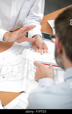 Architects working hard Stock Photo - Alamy