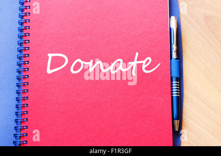 Notepad with text TAX AID with pen, office tools and calculator on ...