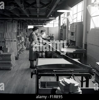 1950s, historical, female workers in office using large data Stock ...