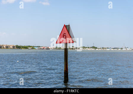 pink triangle open water marker Stock Photo - Alamy