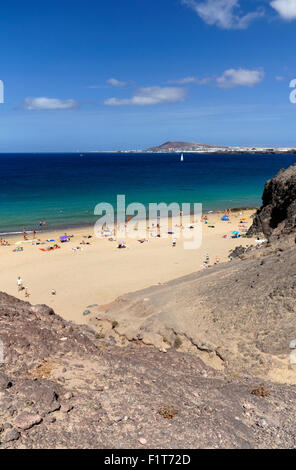 Playa de las Coloradas beach looking towards the sunlit cliffs of ...