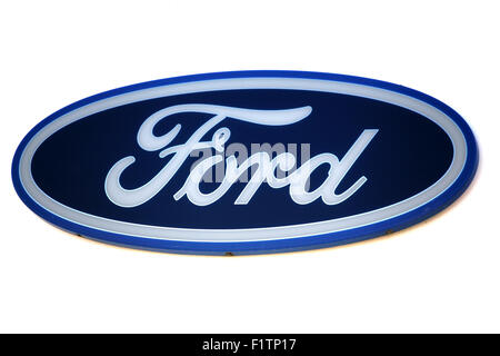 Ford car logo and sign outside car dealer showroom, Exeter Stock Photo ...