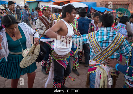 During the celebration of Tinku, several people confronting each other ...