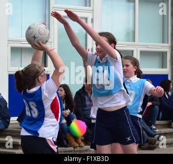 Girls play netball outside Stock Photo - Alamy