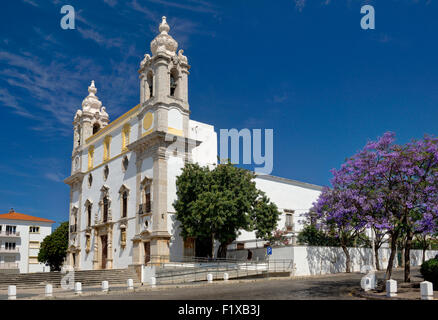 The Igreja do Carmo in Faro, with its Baroque façade and twin bell ...