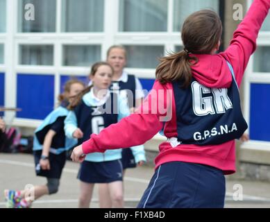 Girls play netball outside Stock Photo - Alamy