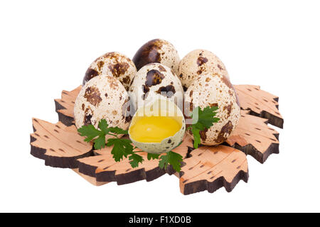 White and quail eggs stand on a burlap on a wooden table Stock Photo ...