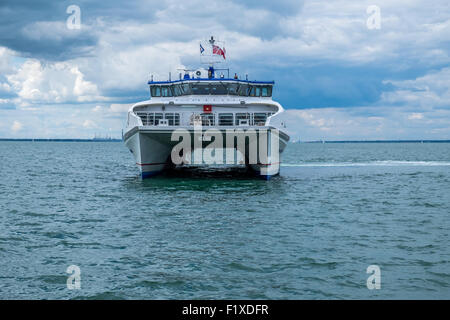 Catermaran coming into Ryde Harbour on the Isle of Wight Stock Photo ...