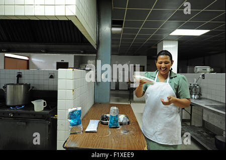 Guatemala, Salama, nurse preparing F100 formula with complementary food ...