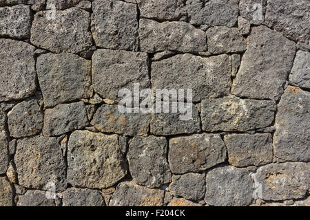 Volcanic Stone wall, useful for background Stock Photo - Alamy