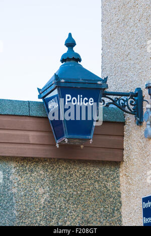 Old fashioned police lamp on the exterior of a police station in ...