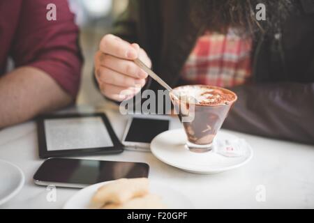 male hand holding tablet having video chat with colleagues. man watch ...