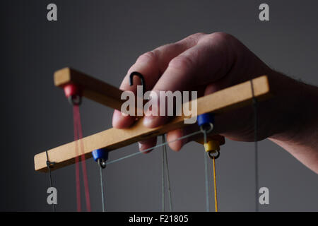 puppeteer and puppet business Stock Photo - Alamy