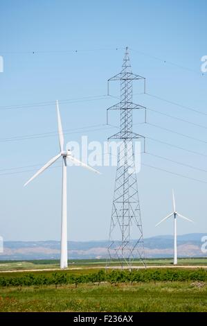 windmill for removable energy production and pylon Stock Photo - Alamy