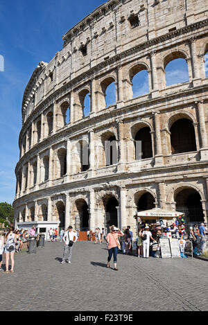 Tourists in front of the Colosseum in Rome Stock Photo - Alamy