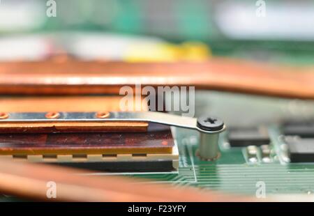 mounting radiator for cpu on notebook motherboard Stock Photo - Alamy