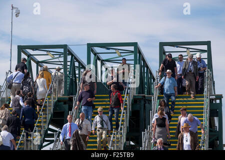 Crowd of people walking down a staircase by River Thames, London ...